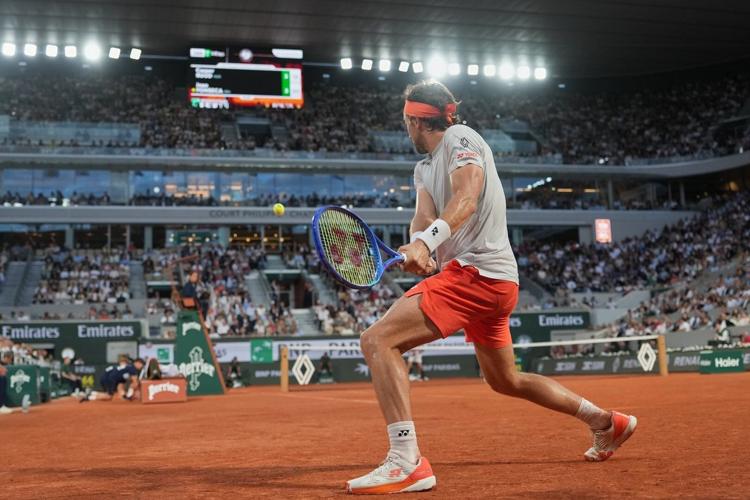 Gustavo Kuerten cheers as fellow Brazilian Joao Fonseca follows in his ...