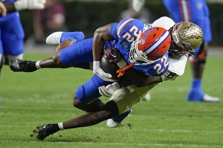 Benson scores 3 times, No. 5 Florida State beats rival Florida 24-15 ...