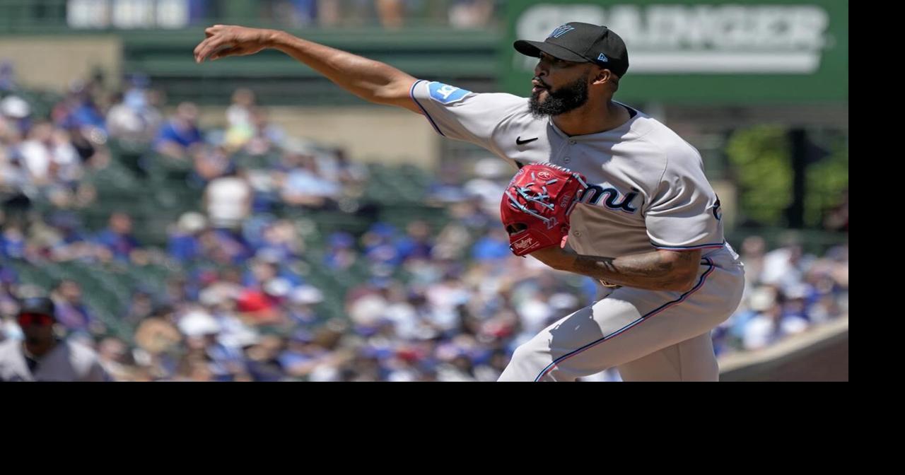 Marlins stop 5-game slide with 14-inning win over Cubs