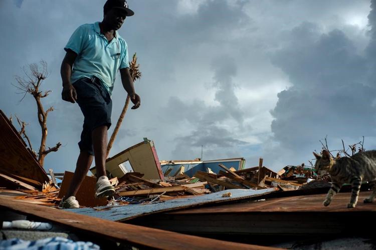 Survivors on Bahamas island mark time as officials lay plans