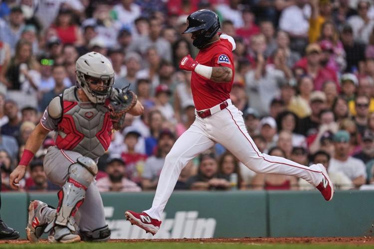 Encarnacion-Strand hits his 1st career grand slam to power Reds' rally ...