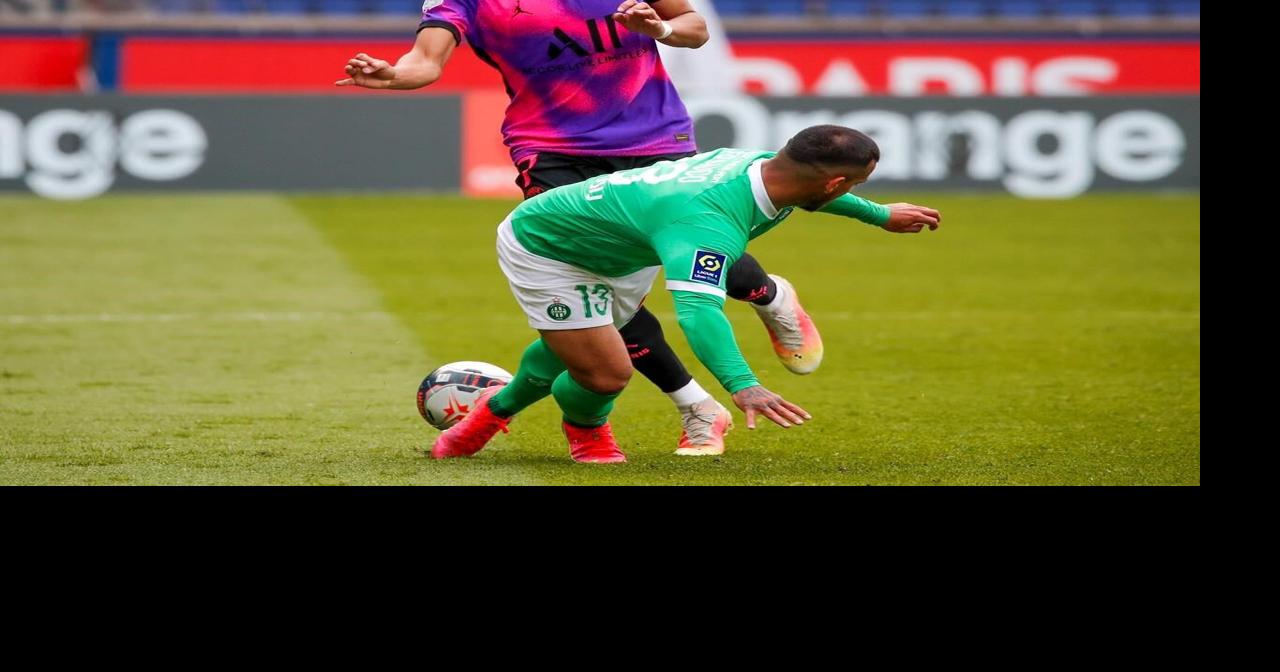 Mbappe scores 2 but injures thigh as PSG tops Ligue 1