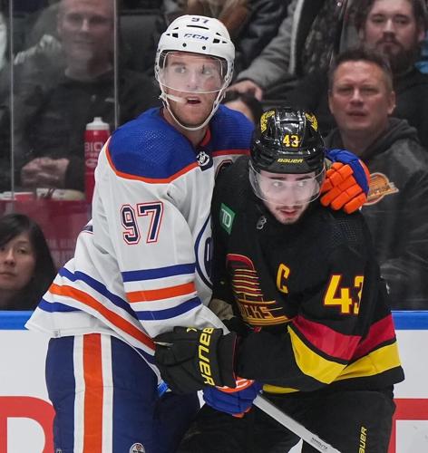 Boeser scores two, Hughes nets four points as surging Canucks whip Oilers 6-2