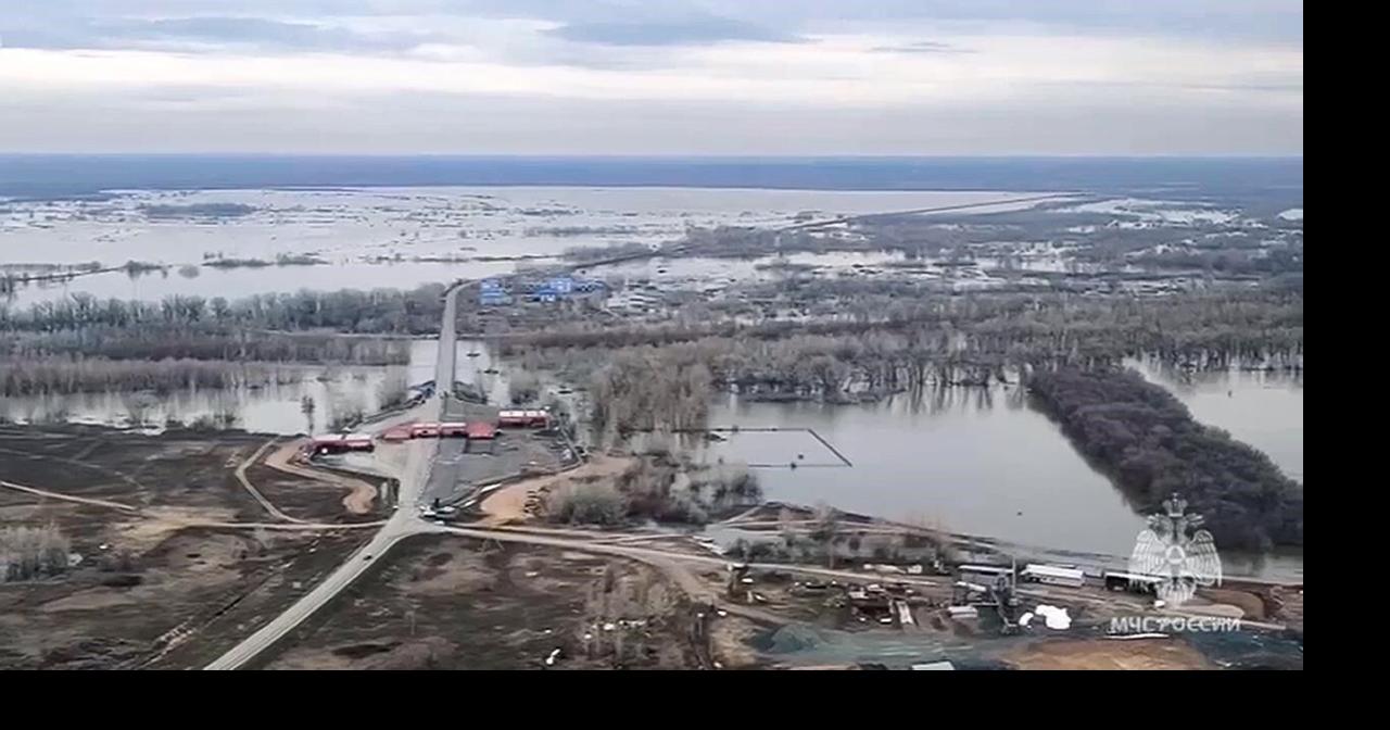 Water levels rise and homes flood in Russia after a dam bursts near the ...