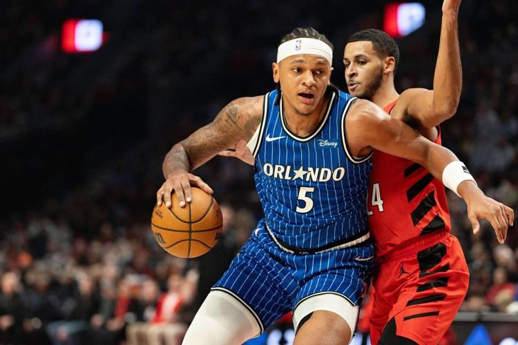 Bane's work on both ends helps Magic hold off Trail Blazers, 110-106