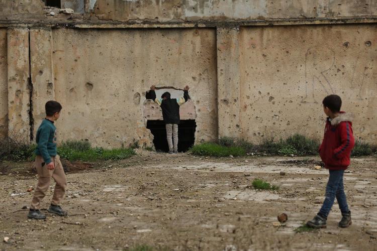 A Kurdish-majority neighborhood in Syria recovers from clashes with ...
