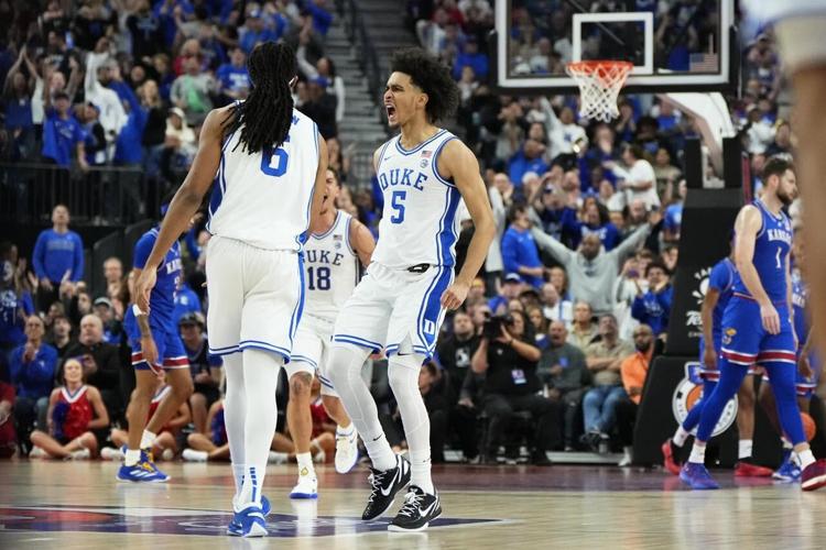 Kansas center Hunter Dickinson ejected for kicking Duke's Maliq Brown ...