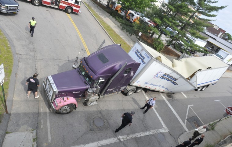 Truck trailer crumples beneath city railroad arch | Local News ...