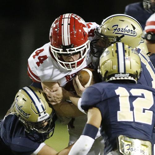 H.S. FOOTBALL: Warriors turn back Rocketeers' late rally to take narrow ...