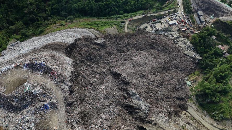 Landfill collapse kills 1 and leaves at least 27 missing, Philippine ...