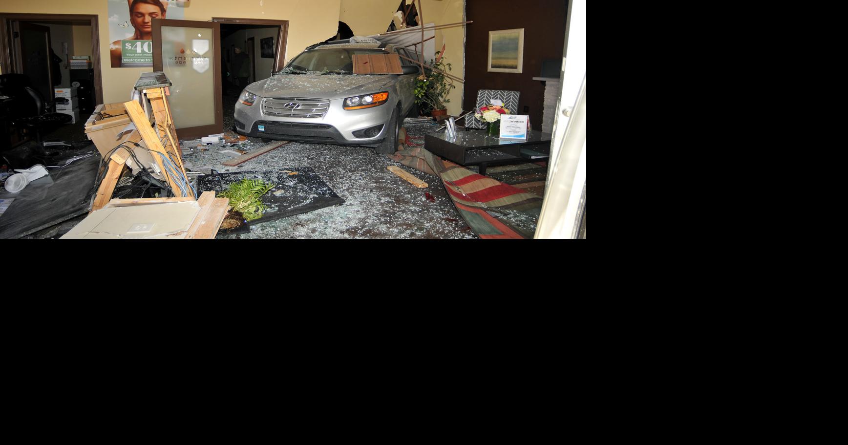 Vehicle crashes through spa in Mansfield | Local News | thesunchronicle.com