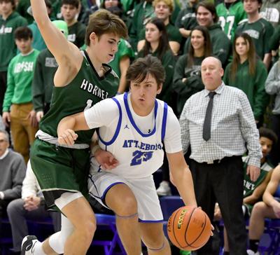 H.S. BOYS BASKETBALL: Hornets storm back to topple Bishop Feehan ...