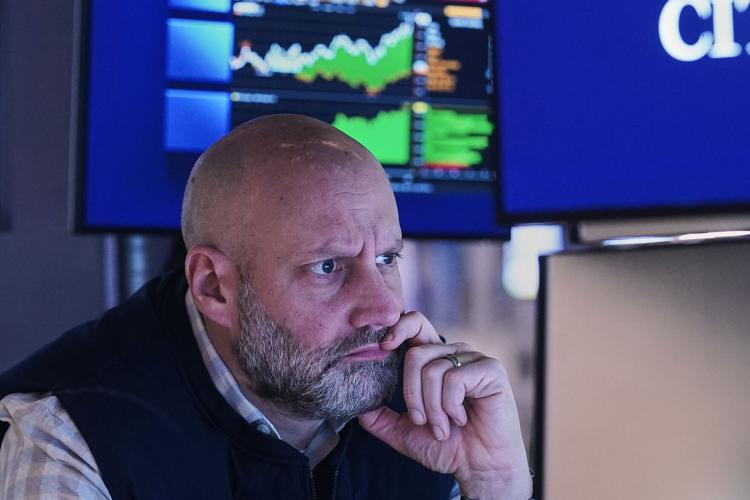 Wall Street sets a record after a mixed day of trading | Business ...