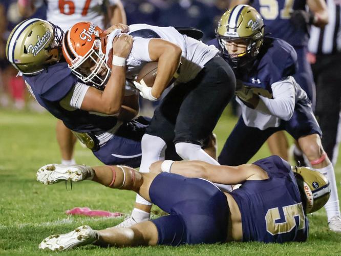 H.S. FOOTBALL: Foxboro flexes its muscles in blowout of Oliver Ames ...