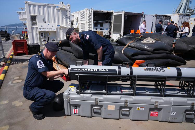 Britain's navy prepares to clear mines in the Strait of Hormuz while ...