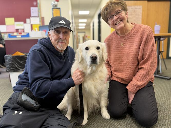 Retired psychologist and his dog Hannah volunteer at Ahern Middle ...