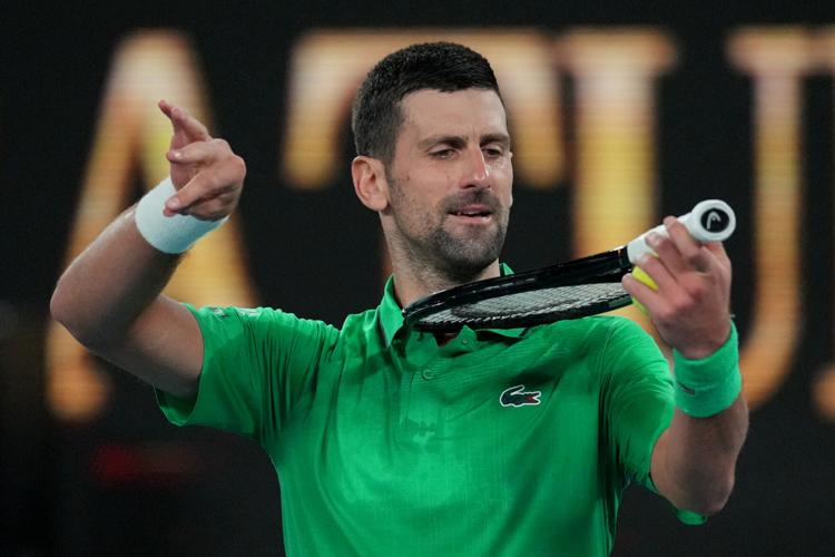 Novak Djokovic advances to Australian Open quarterfinals on a walkover ...