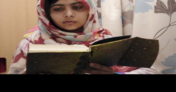 Shot Pakistani teen Malala Yousafzai writing book | Stories ...