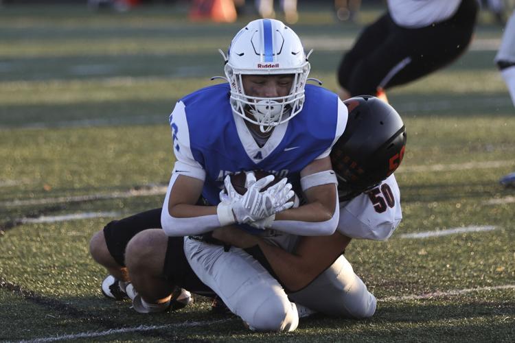 H.S. FOOTBALL: Bombardiers hit on all cylinders to race past Black ...