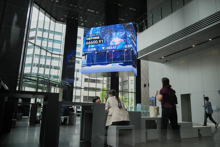 Wall Street adds to its records as the AI boom keeps growing | Business ...