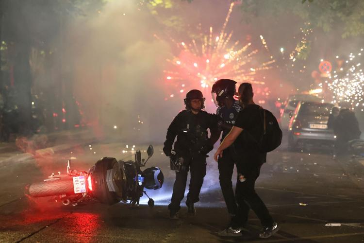 Paris police detain dozens after violence erupts during celebrations of ...
