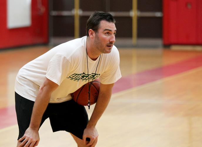 North native Babul working the court changeover with Long Island Nets ...