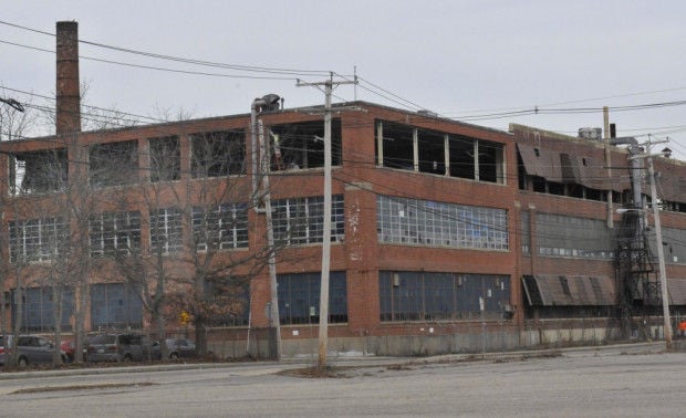 Huge heap of rubble following demo of first Swank building in Attleboro ...