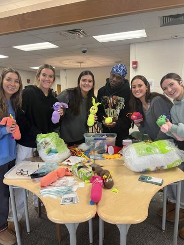 Community Warriors give back at Foxboro High | Local News ...