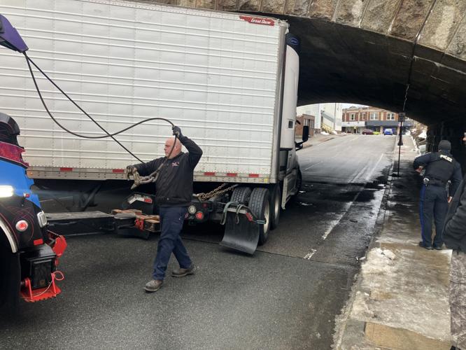 Tractor-trailer gets stuck under bridge in Attleboro | Gallery ...