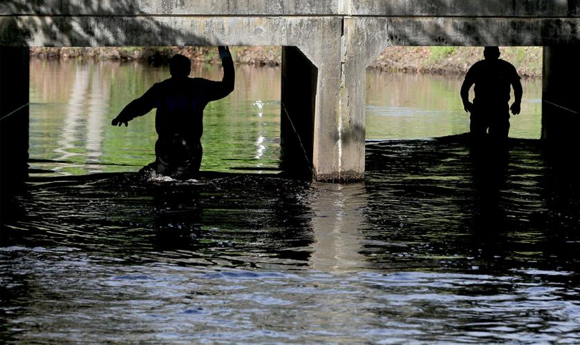 Dirty work cleaning up Attleboro river | Local News | thesunchronicle.com