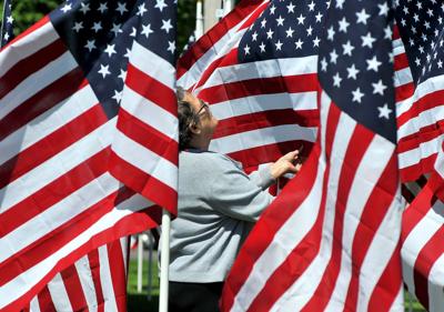 Swiped flags recovered in Mansfield | Local News | thesunchronicle.com