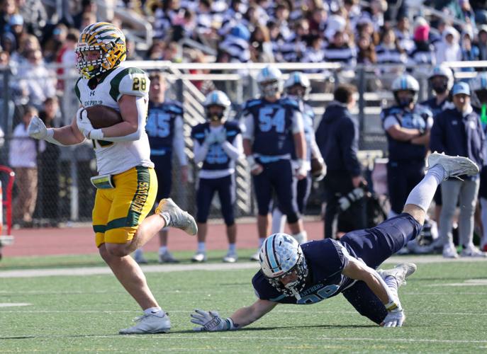 H.S. FOOTBALL: King Philip clinches third straight Kelley-Rex title in ...
