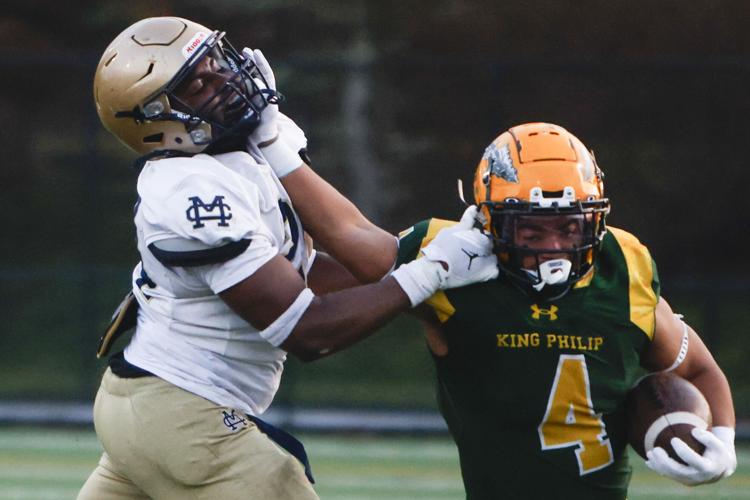 H.S. FOOTBALL: Defense holds firm to send King Philip to Super Bowl ...