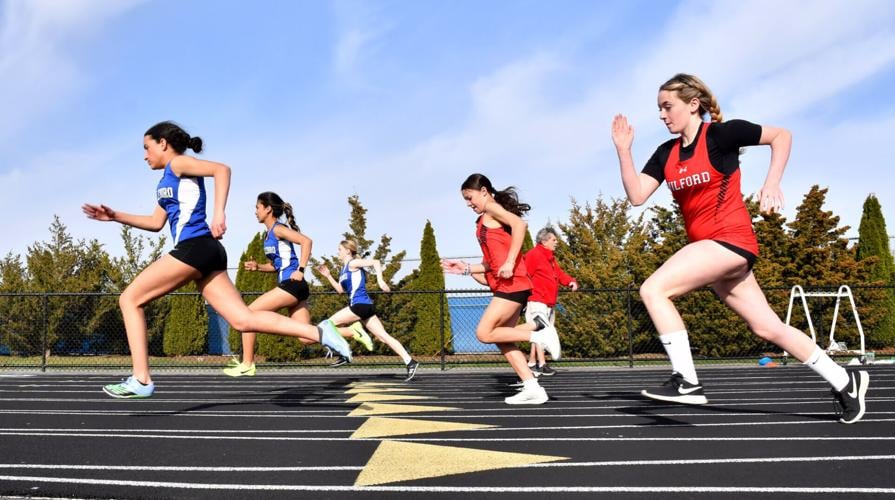 H.S. OUTDOOR TRACK: Bombardier boys, girls take two from Milford ...