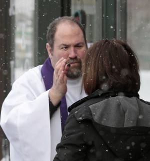 In busy times, Father Ed has 'Ashes to go' | Features | thesunchronicle.com