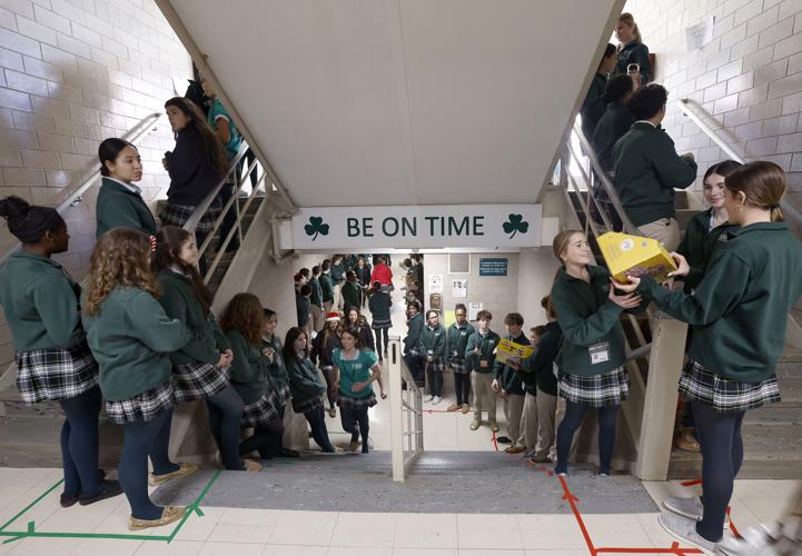 Feehan students form human toy chain for annual Santa Shop | Gallery ...