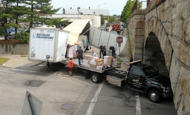 Truck trailer collapses, blocks road | Local News | thesunchronicle.com