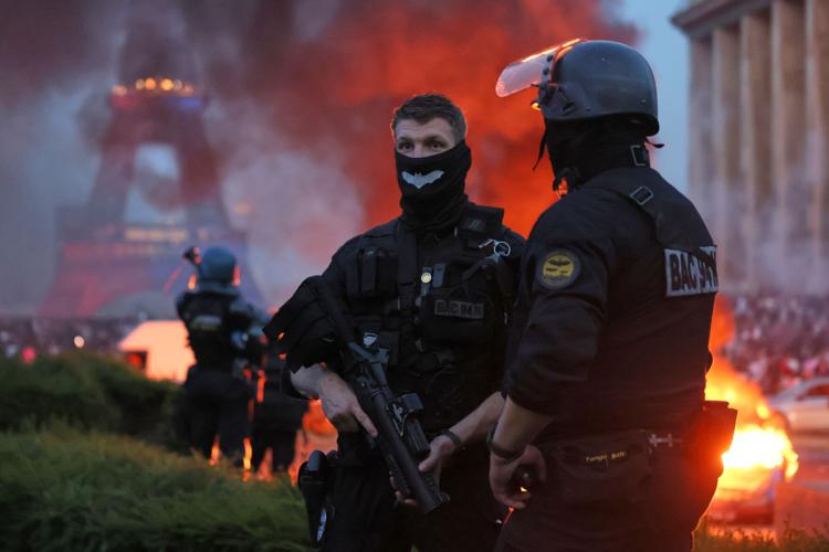 Paris police detain dozens after violence erupts during celebrations of ...