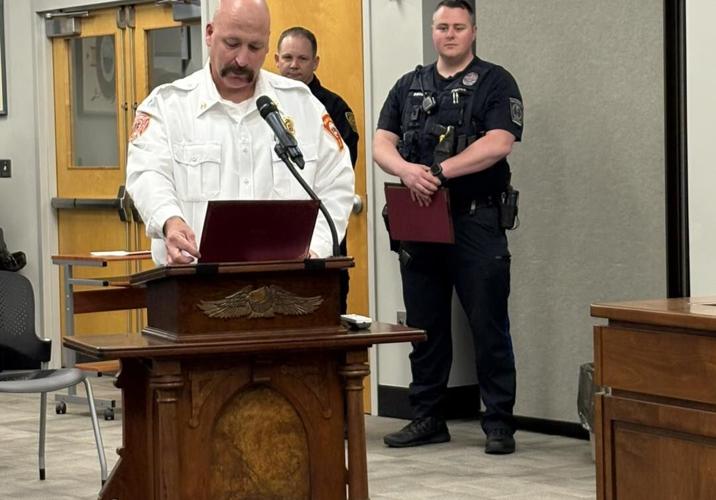 Heroic neighbor, officer recognized for efforts at Mansfield house fire ...