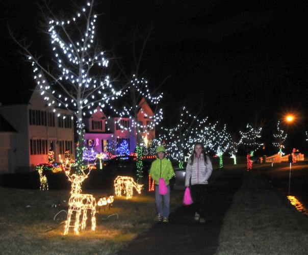 Norton neighbors raise $1,200 for Komen foundation with Christmas ...
