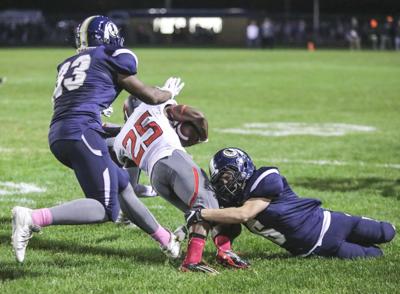 FOOTBALL: Scarlet Hawks fly high past Warriors | Sports ...