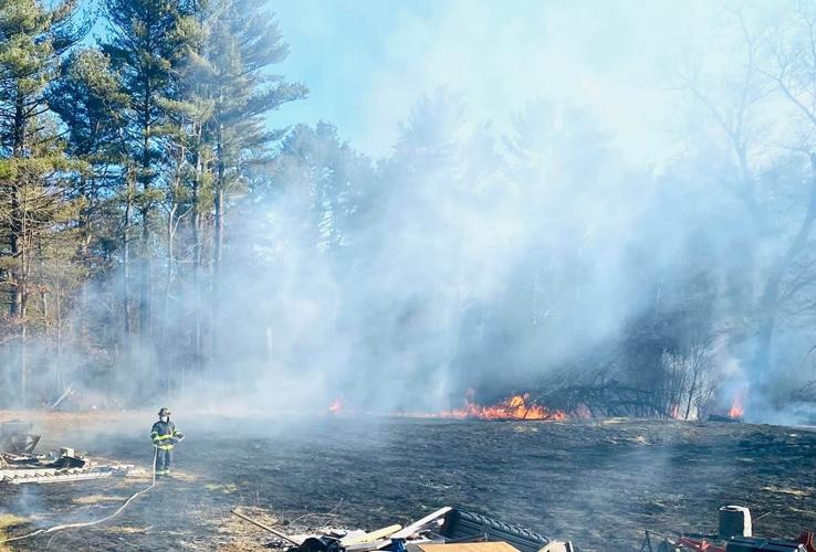 Firefighters from four towns battle large brush fire in Wrentham ...