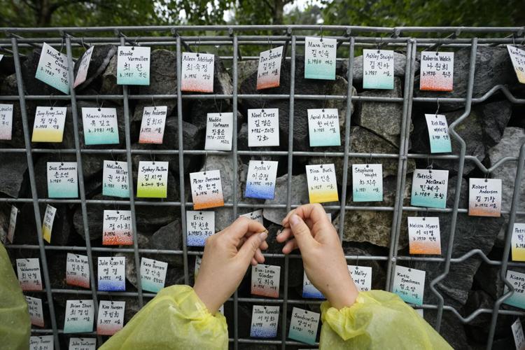 A wall of nametags at a South Korean park testifies to adoptees ...