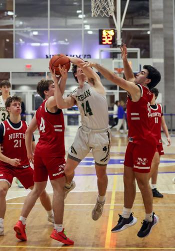 H.S. BOYS BASKETBALL: Shamrocks flex their muscles over Rocketeers ...