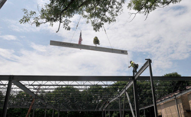 Markman raises beam for construction project | Business ...