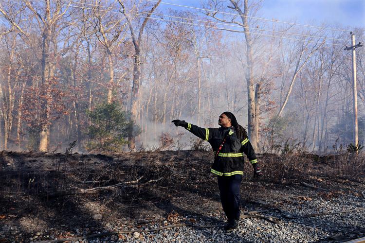 Crews from several communities battle brush fire along Foxboro train ...