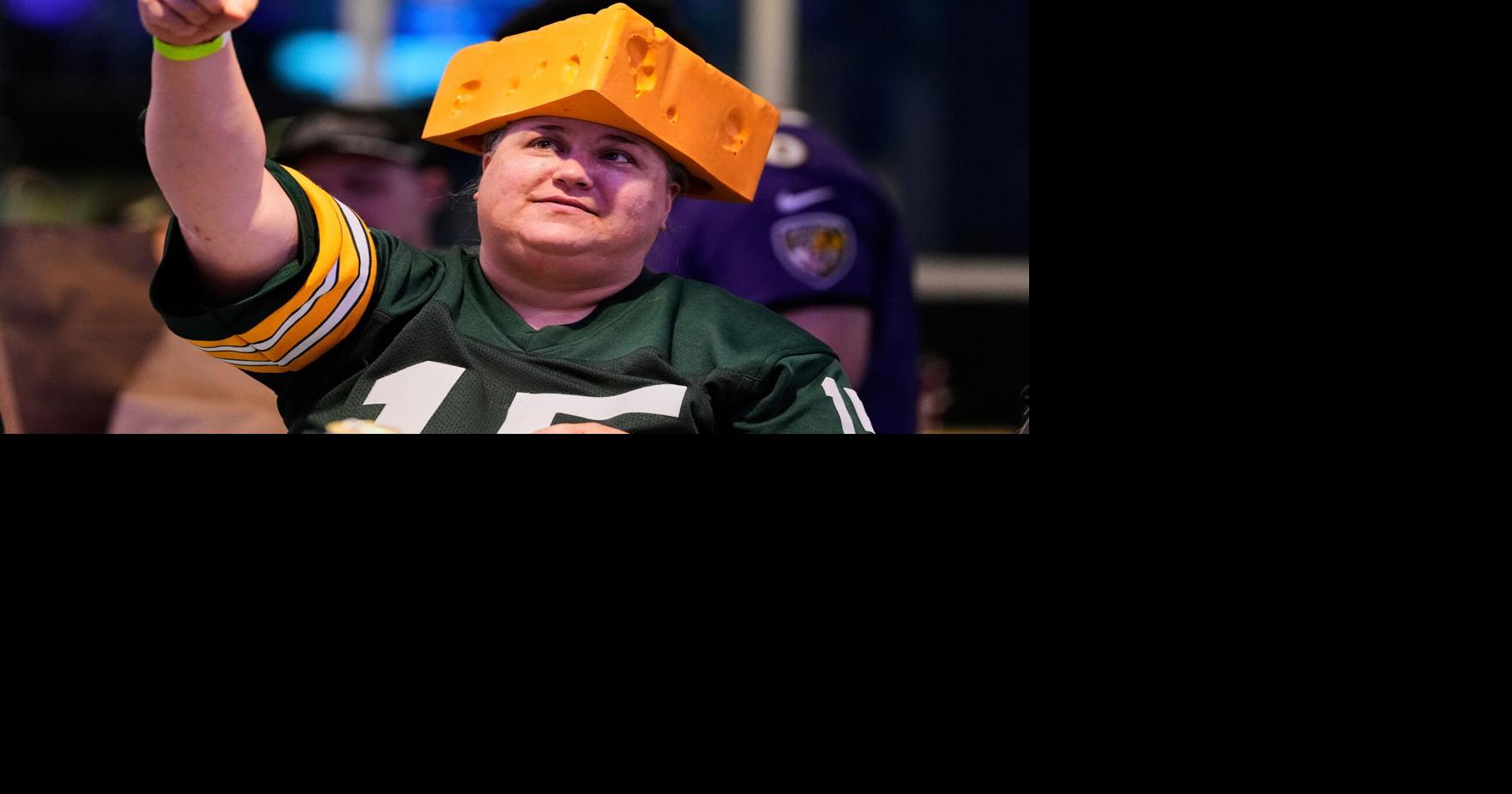 The cheesehead hat is a sunny nod to America's 'Hold my beer ...