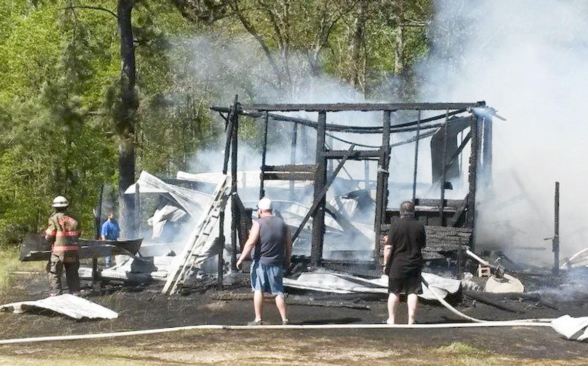 Fire reduces private clubhouse to charred shell near Springfield