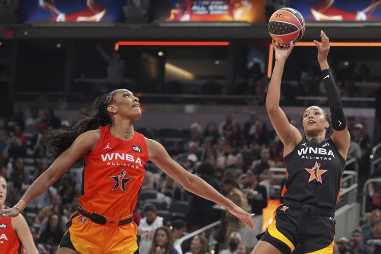 Collier's record-breaking performance leads her team to victory in WNBA ...