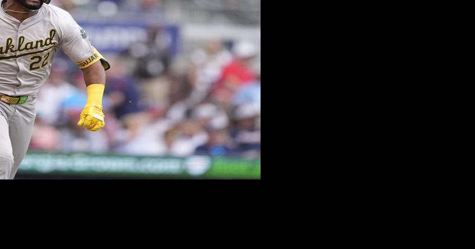 A's beat scuffling Braves 11-9